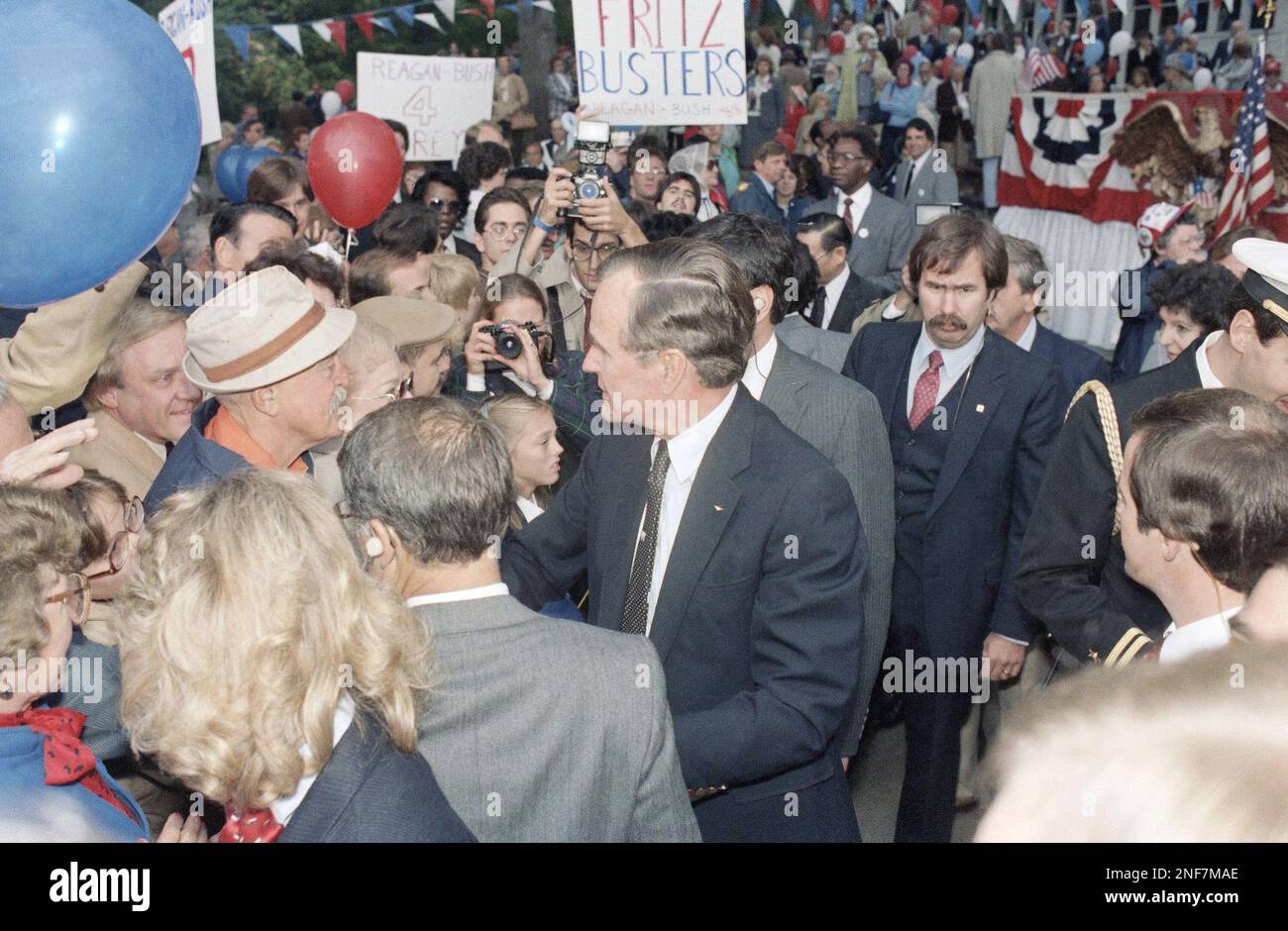 U.S. Vice-President George H. Bush shown with supporters, Oct. 2, 1984 ...