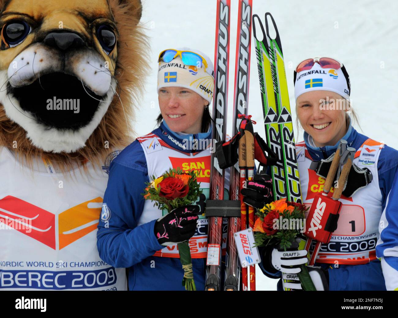Sweden's Lisa Andersson, left, and Anna Olsson react after the Team ...