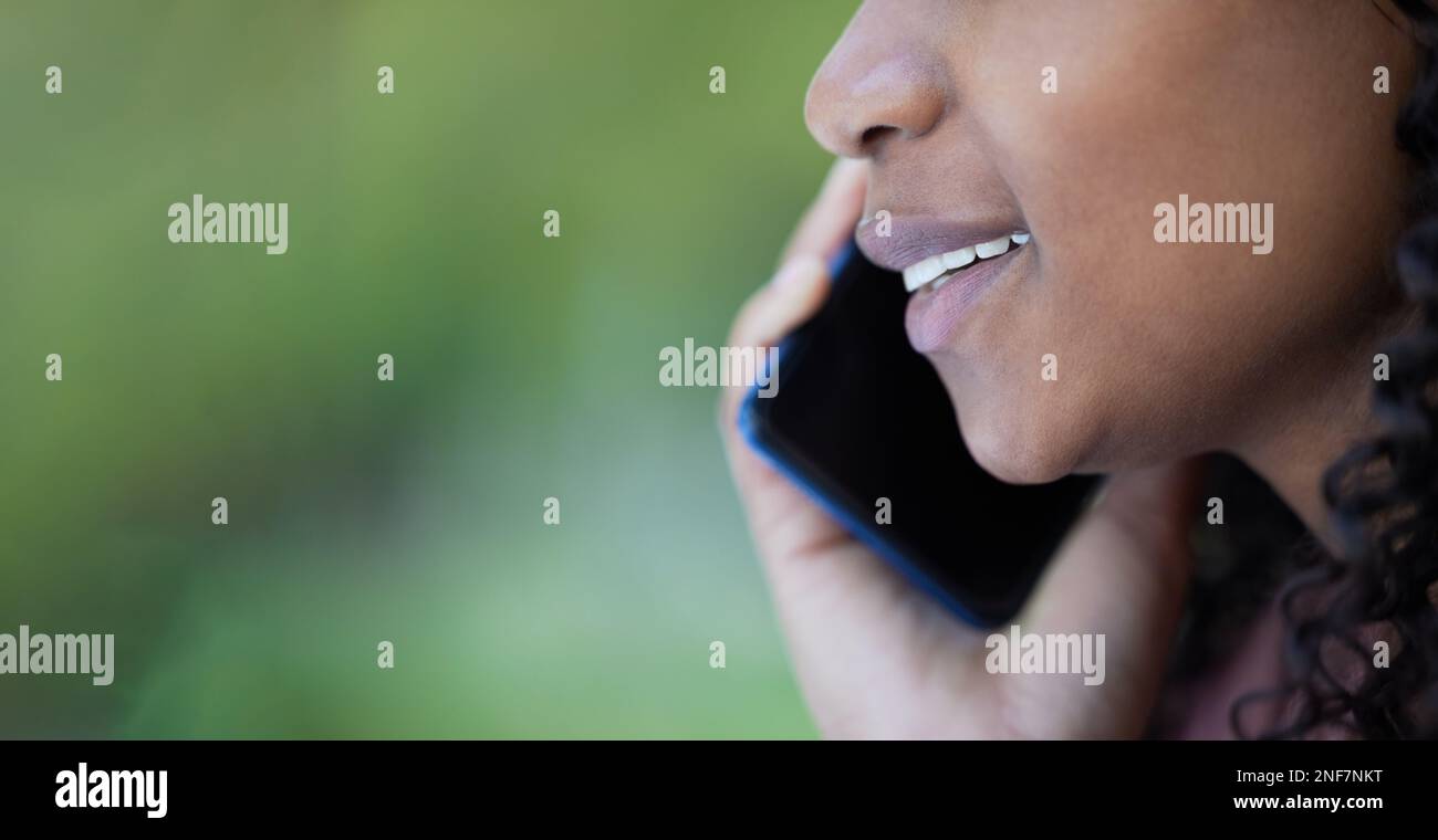 Phone call, black woman and face outdoor on a mobile connection with ...
