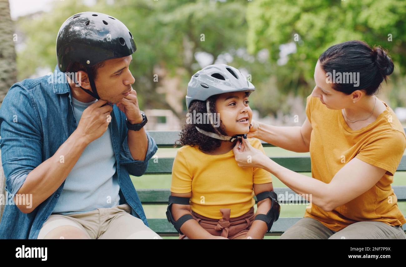Parents, park bench and helmet with child, helping hand and safety for ...