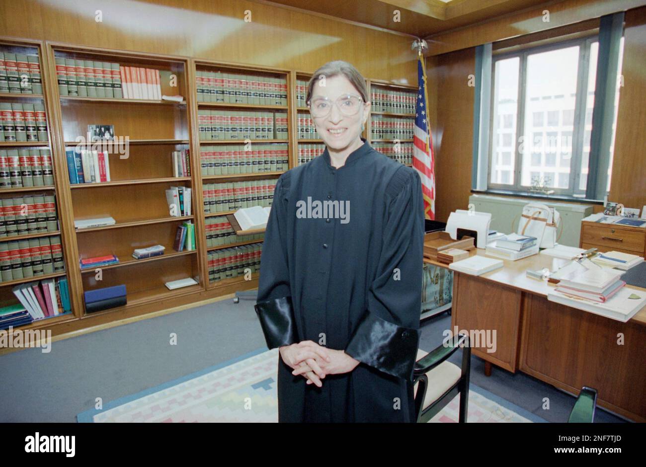Judge Ruth Bader Ginsburg poses in her robe in her office at U.S ...