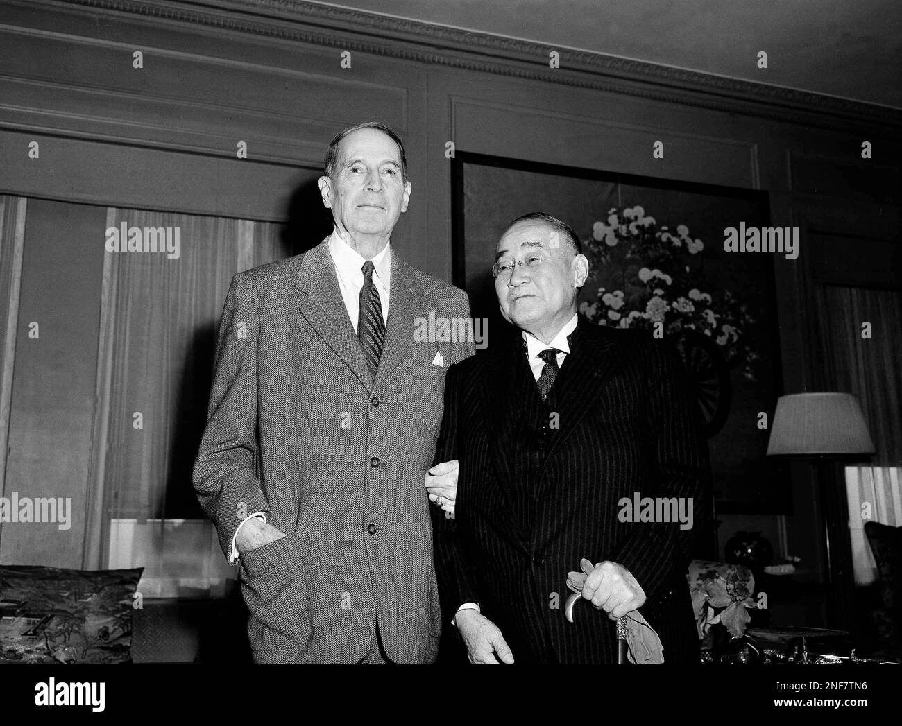 General Douglas MacArthur is shown with Japanese Prime Minister Shigeru ...