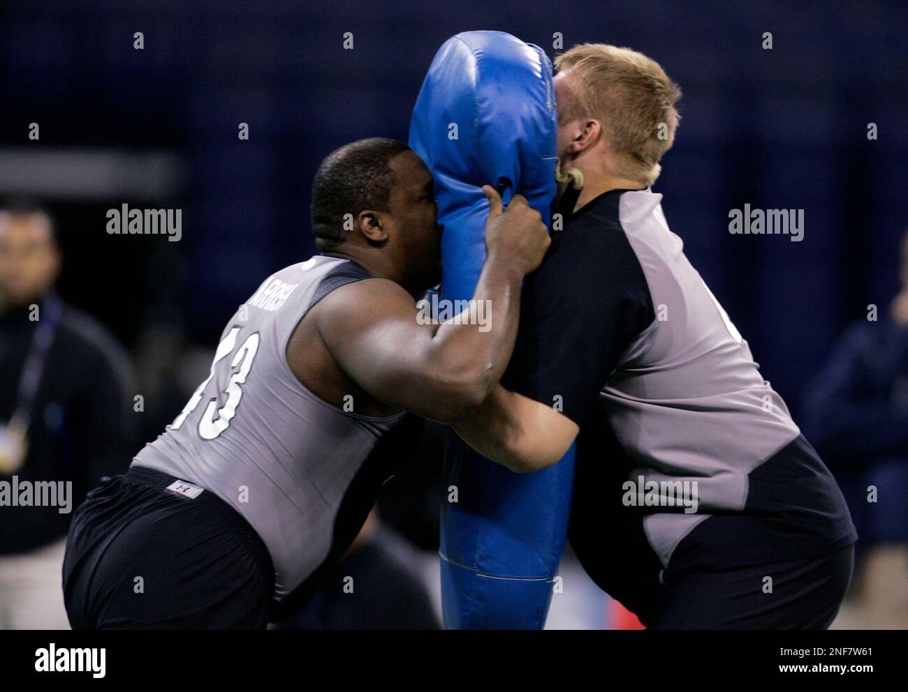 Kent State offensive lineman Augustus Parrish, left, and Iowa offensive ...