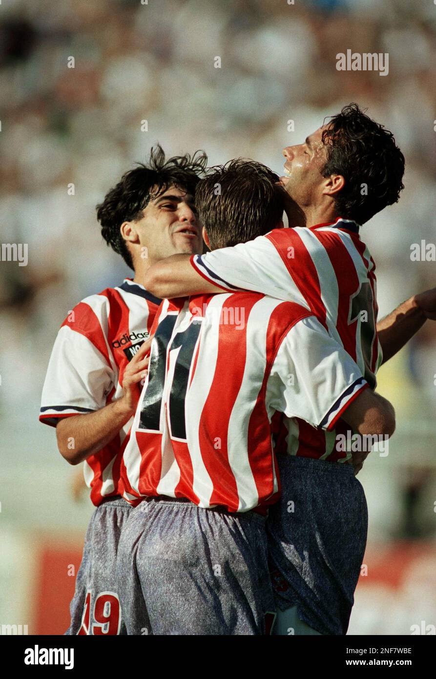 Roy Wegerle, right, celebrates with teammates Eric Wynalda (11) and Joe ...