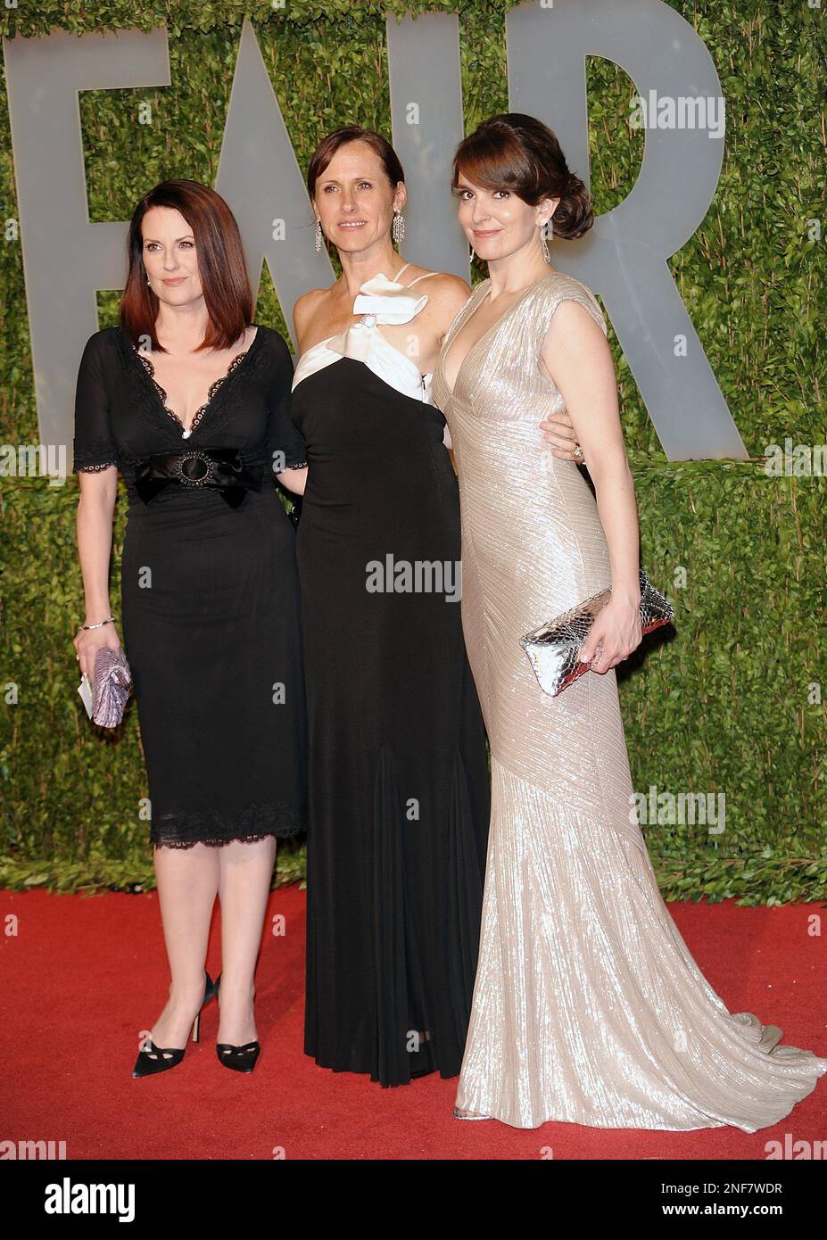 From left, actresses Megan Mullally, Molly Shannon and Tina Fey leaving ...