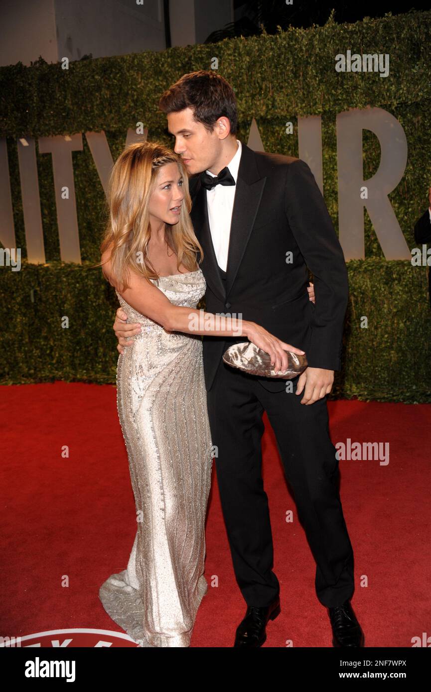 Actress Jennifer Aniston, left, and musician John Mayer arrive at the ...