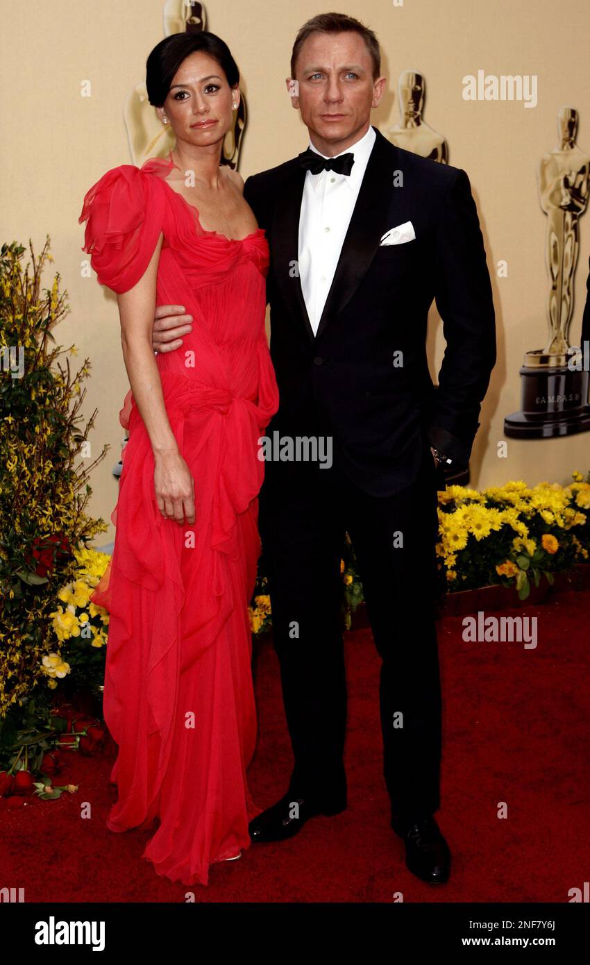 British actor Daniel Craig, right, with Satsuki Mitchell arrives for ...