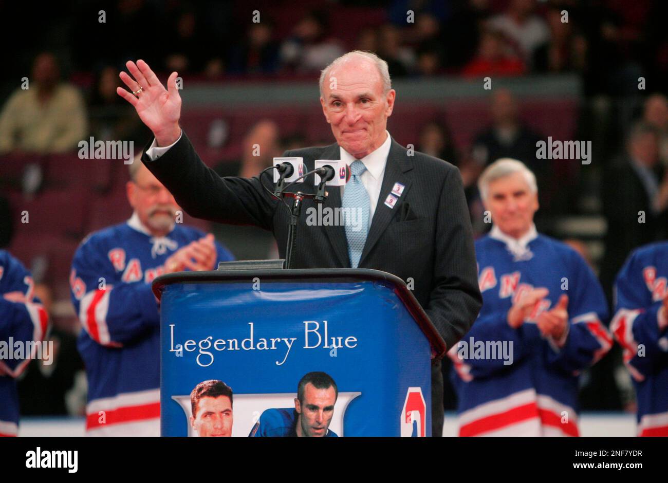 Harry Howell waves to the crowd during a ceremony to retire his number ...
