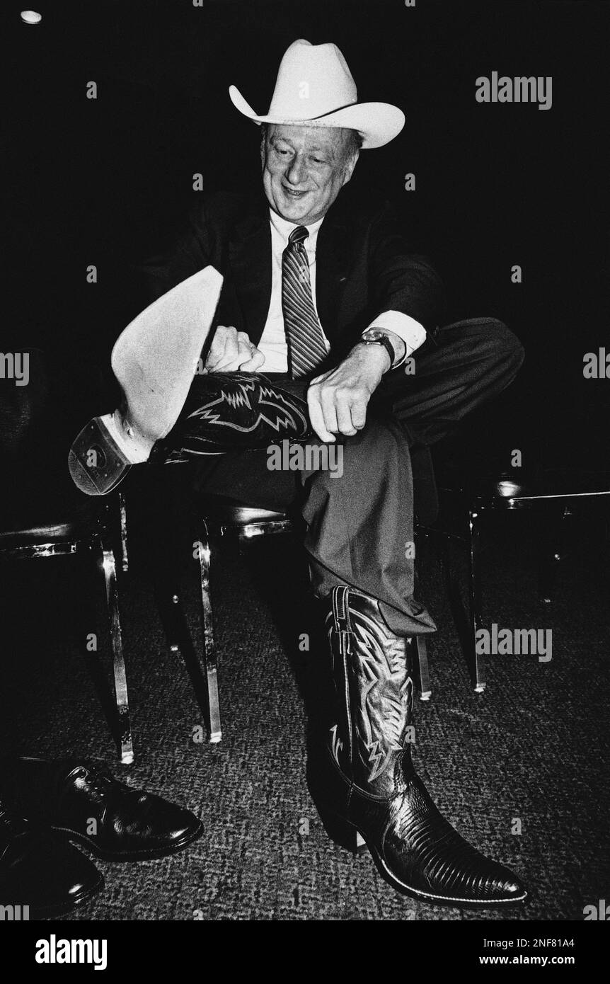 New York Mayor Ed Koch goes Texas as he wears his western hat and tries ...