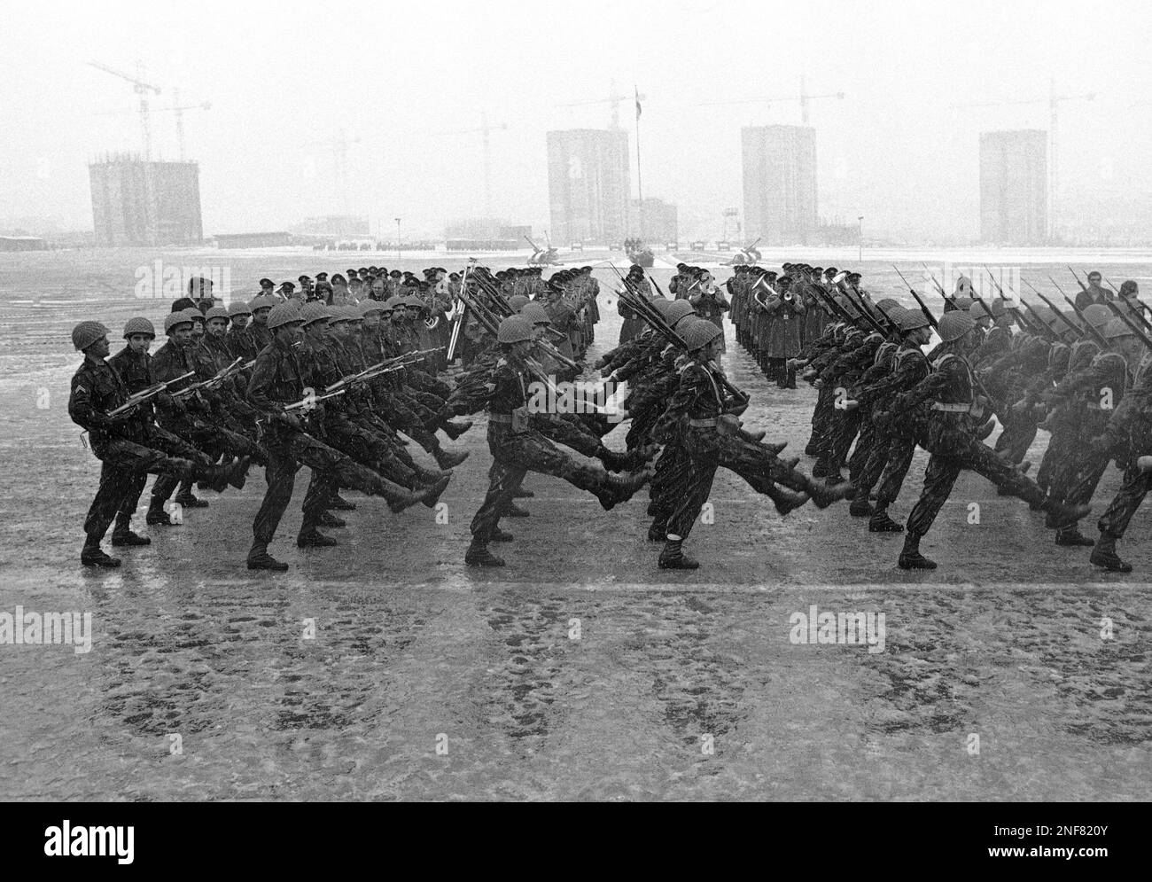 Army units goose step on a parade ground near Niavaran Palace as the ...