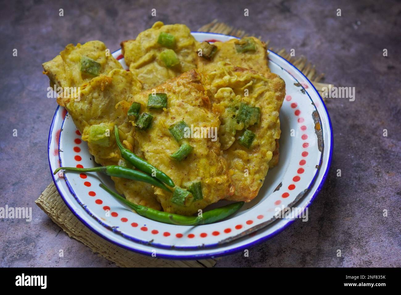 Deep fried tempeh : Tempe Mendoan Stock Photo - Alamy