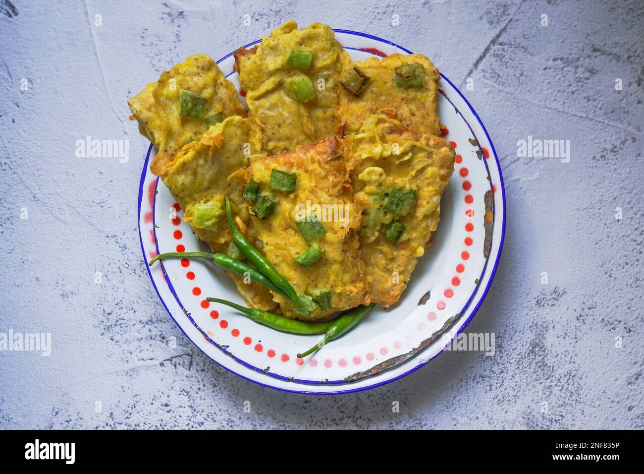 Deep fried tempeh : Tempe Mendoan Stock Photo - Alamy