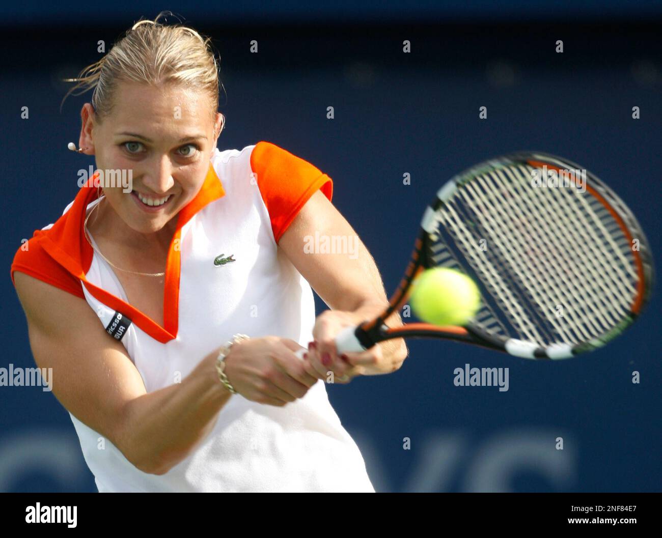 Russia's Elena Vesnina returns the ball to Estonia's Kaia Kanepi during ...