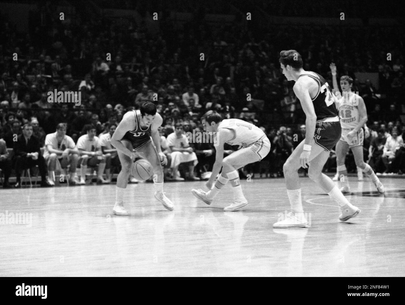 Bill Hann, 14, right, of Tennessee, moves in to attempt steal from Tony ...