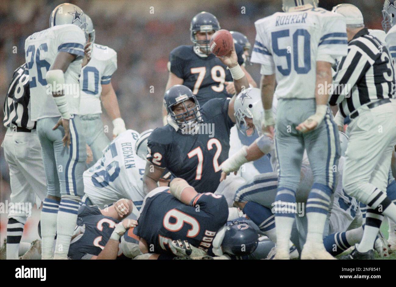 Chicago Bears William “the Fridge” Perry holds the ball to celebrate ...