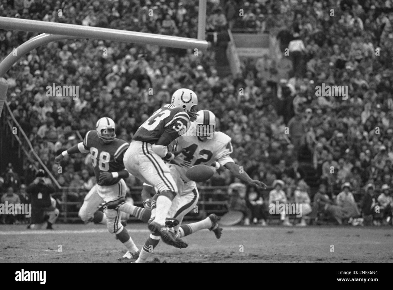 Wide receiver Ed Hinton missed this pass from quarterback Johnny Unitas ...