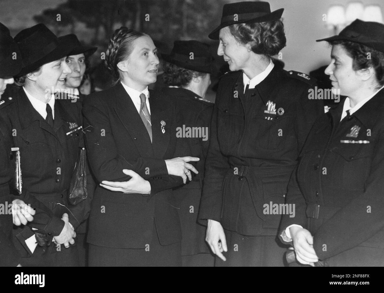 Mrs. Gertrud Scholtz-Klink, center left, Germany's ...