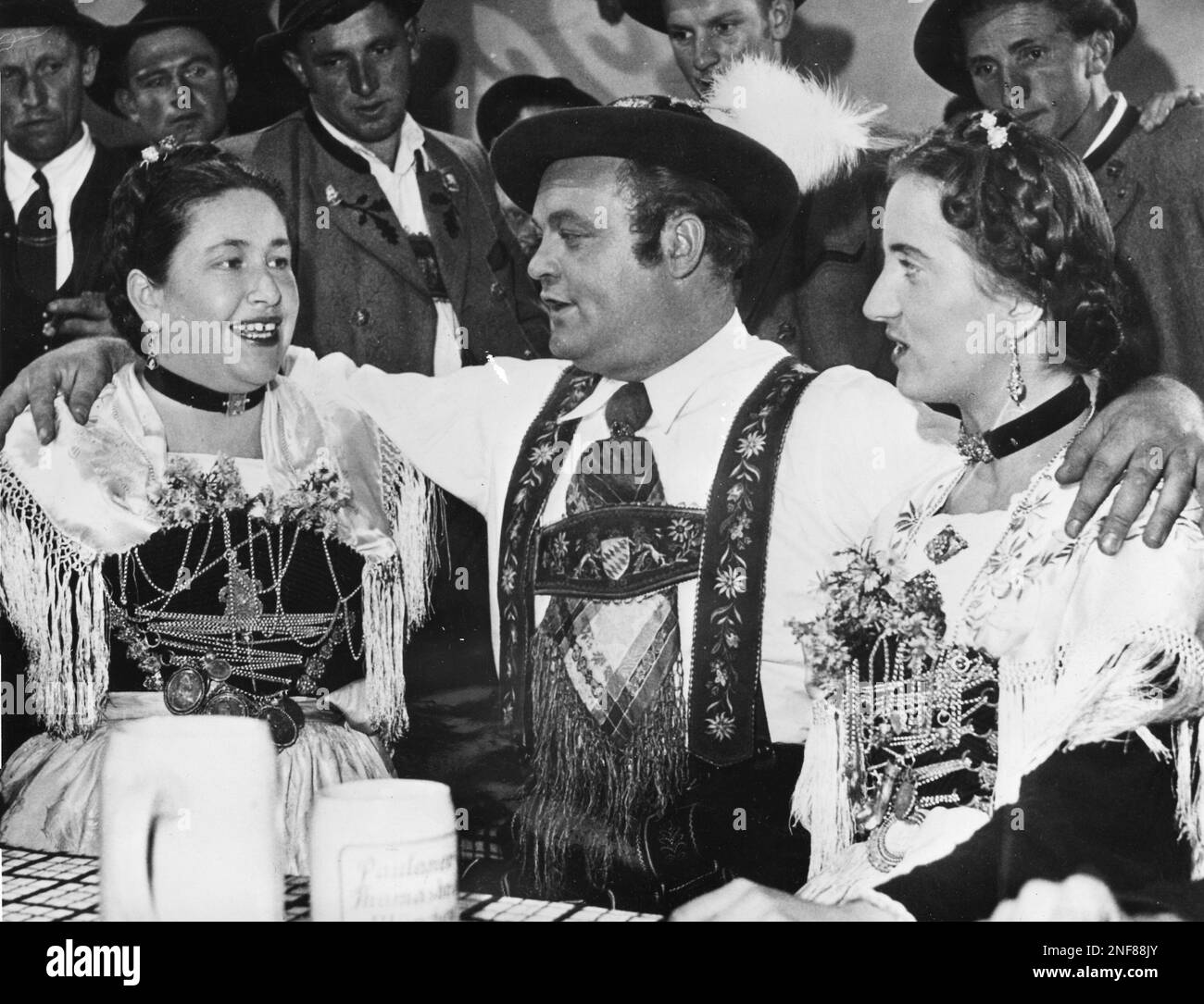West German bob ace Anderl Ostler, and Olymic gold medal winner, center ...