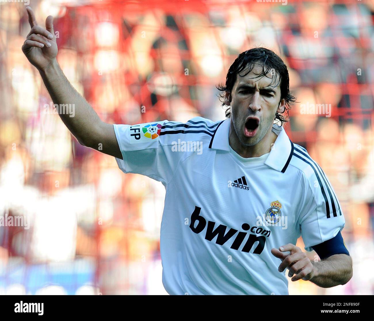 Real Madrid's Raul Gonzalez celebrates after scoring against Sporting ...
