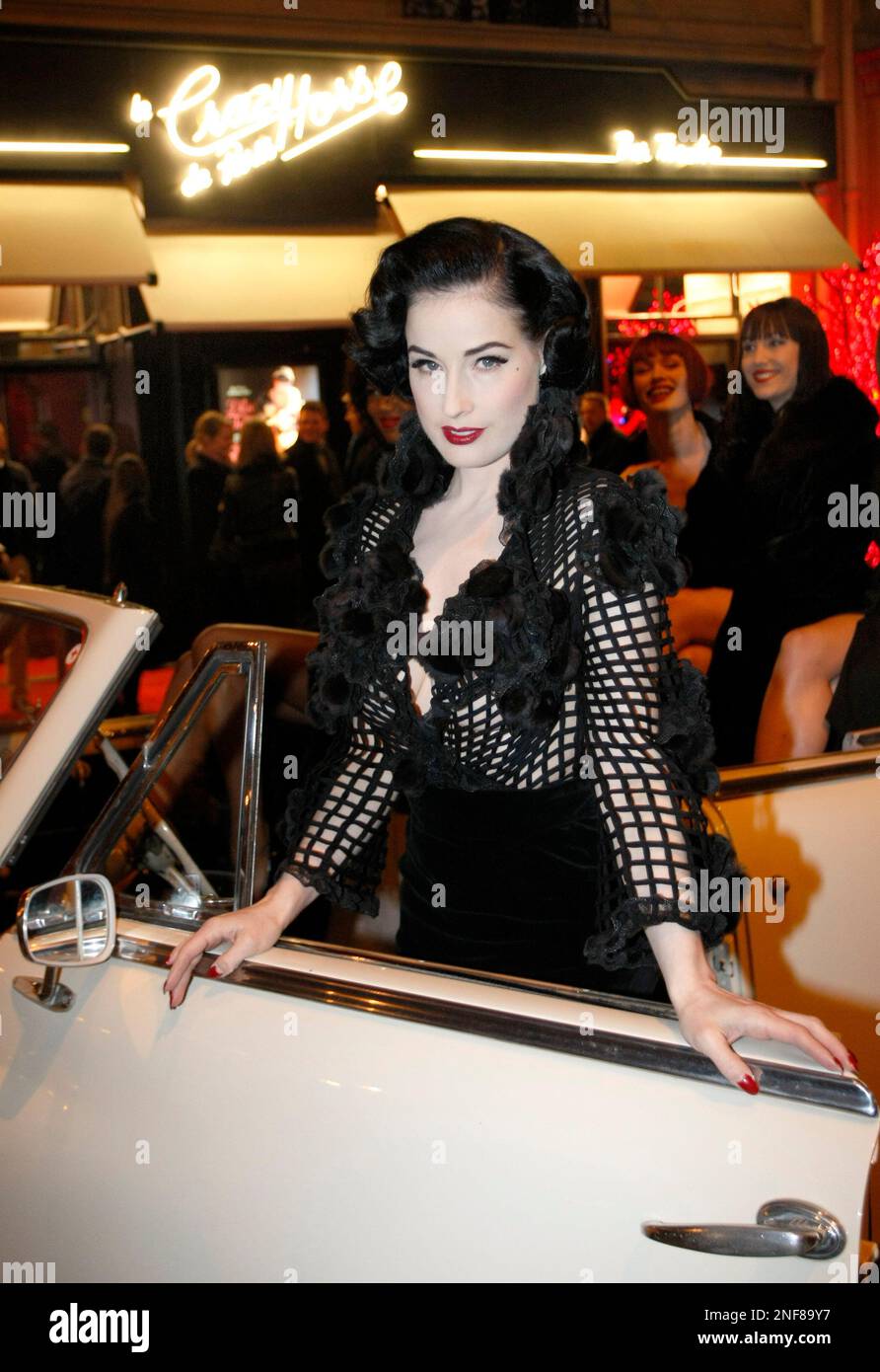U.S. burlesque dancer Dita Von Teese poses before her last show at the ...
