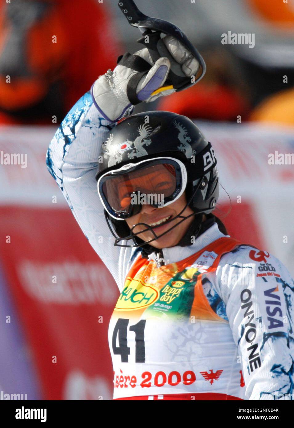 Japan's Mizue Hoshi reacts after completing the first run of the Women ...
