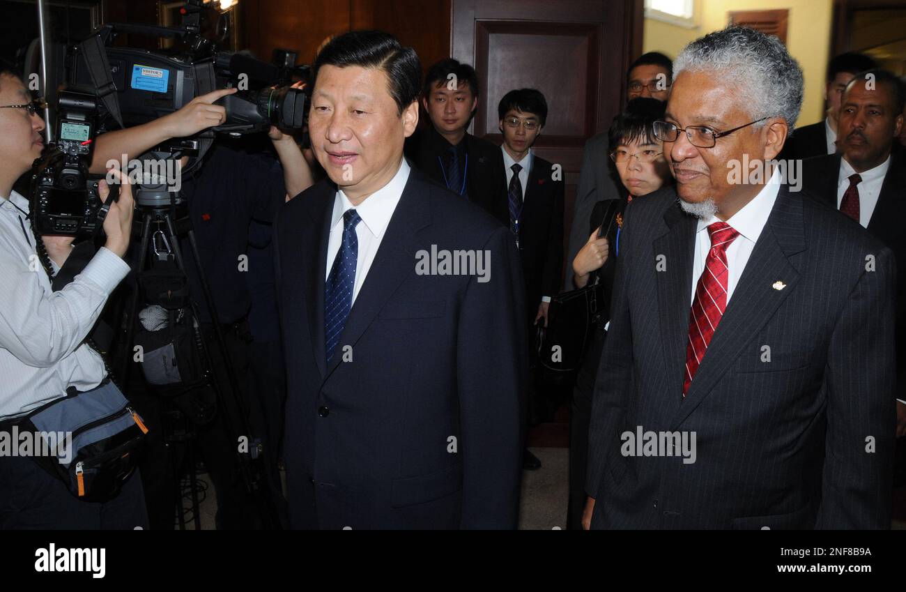 China's Vice President Xi Jinping, accompanied by professor Nigel ...