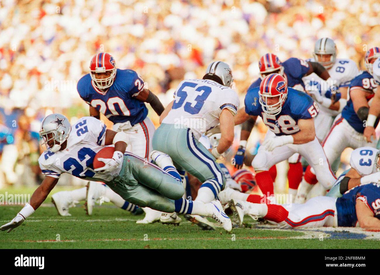 Dallas Cowboys Emmitt Smith (22) stretches for a one-yard loss in the ...
