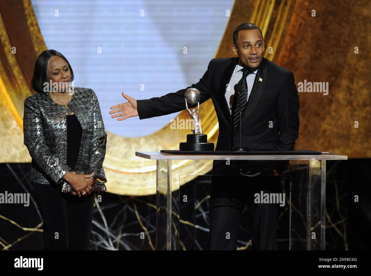 Hill Harper accepts the award for outstanding actor in a drama series ...