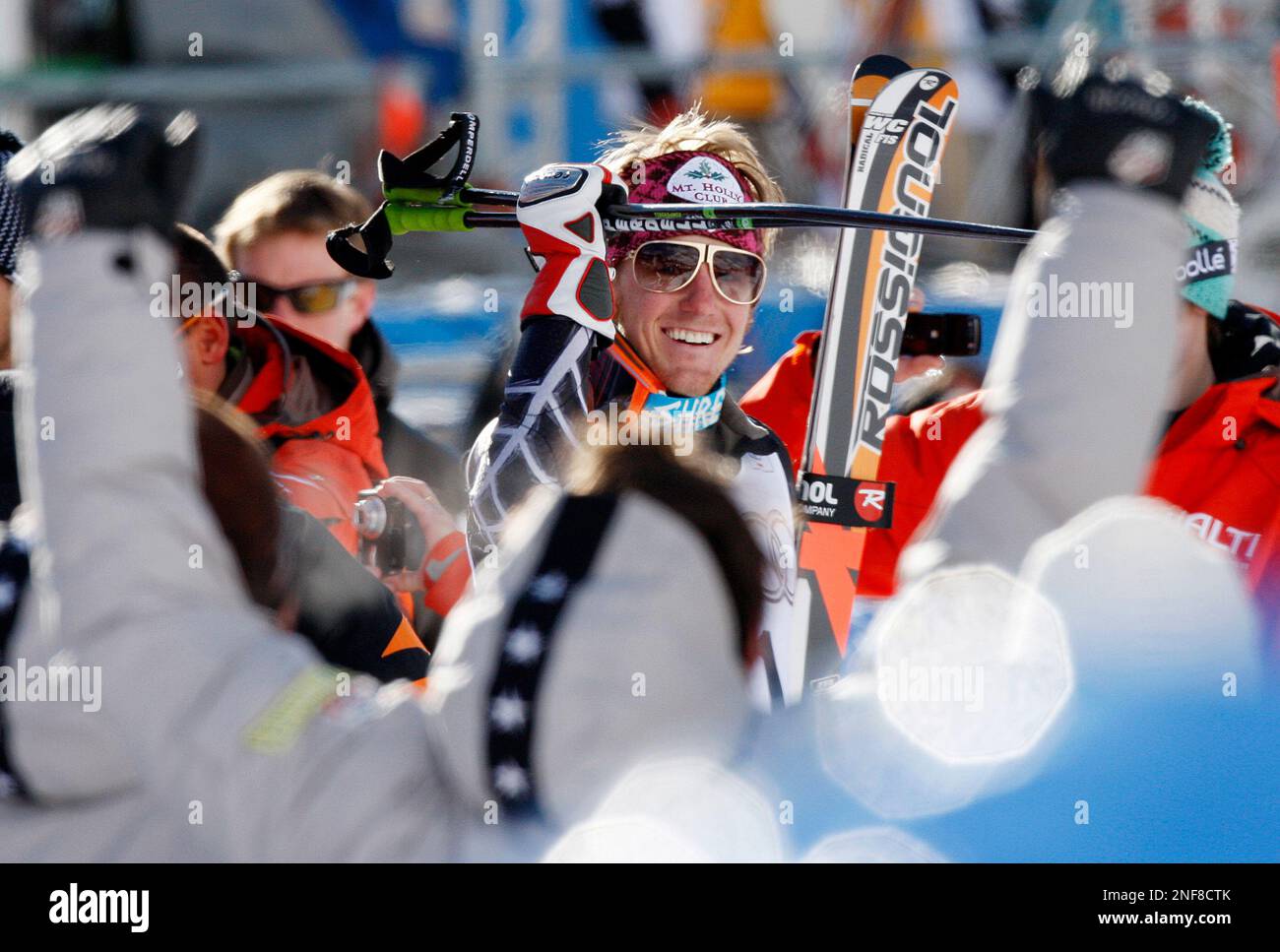 Ted Ligety, of the United States, celebrates his bronze medal of the ...