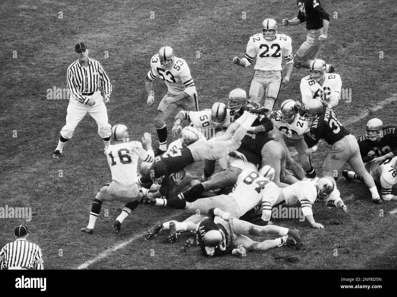 Tom Leiser (25), Navy back, dives over for a touchdown in second period ...