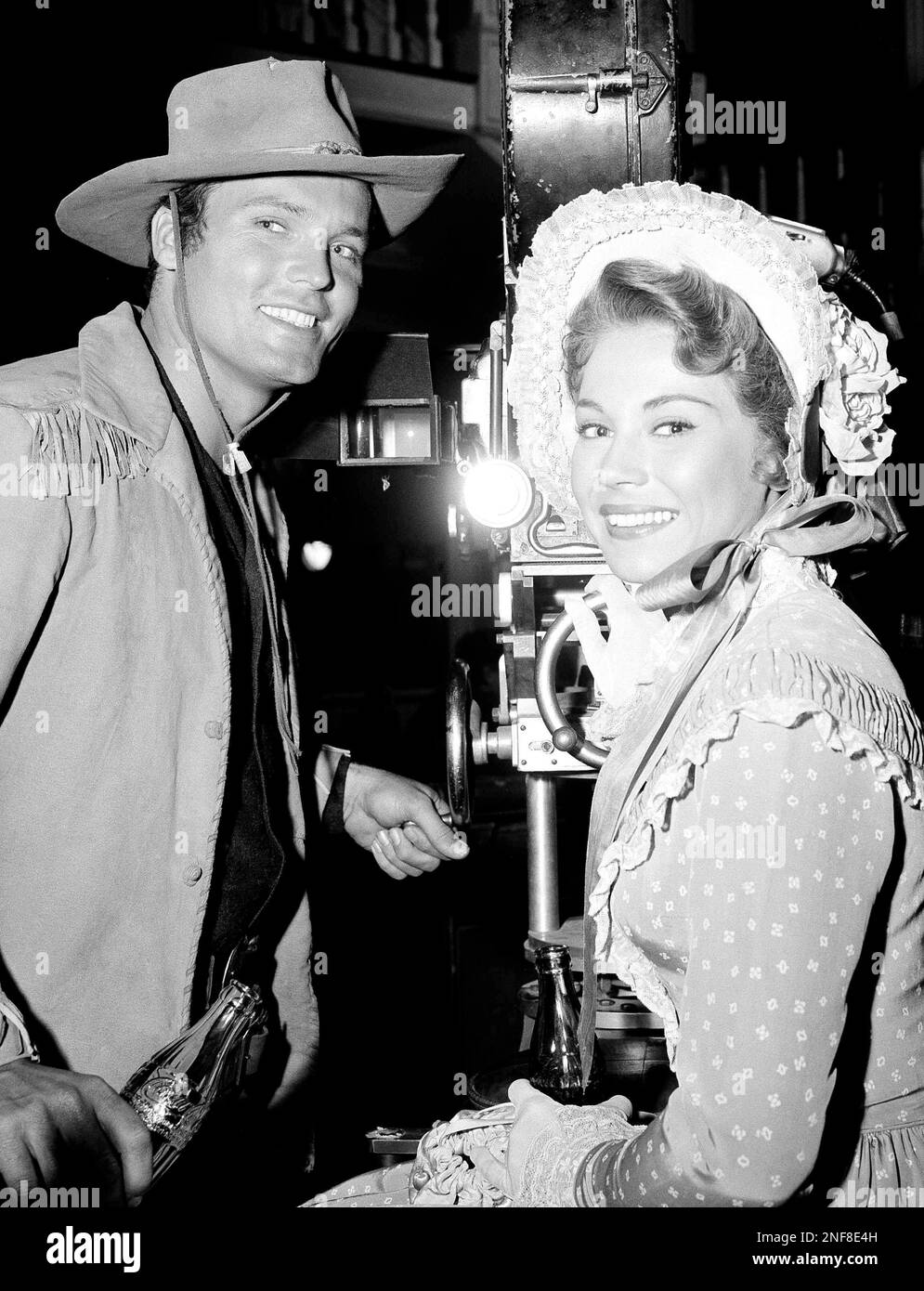 Actor Ty Hardin, left, star of the "Cheyenne" television series, poses ...