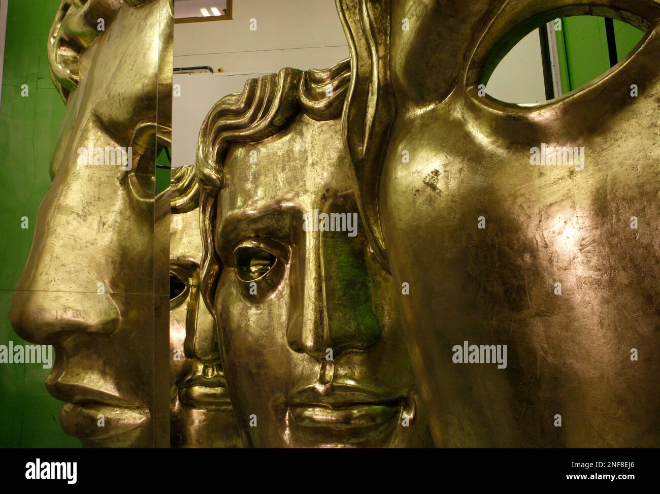 Large British Academy Film mask statues before they are cleaned and ...