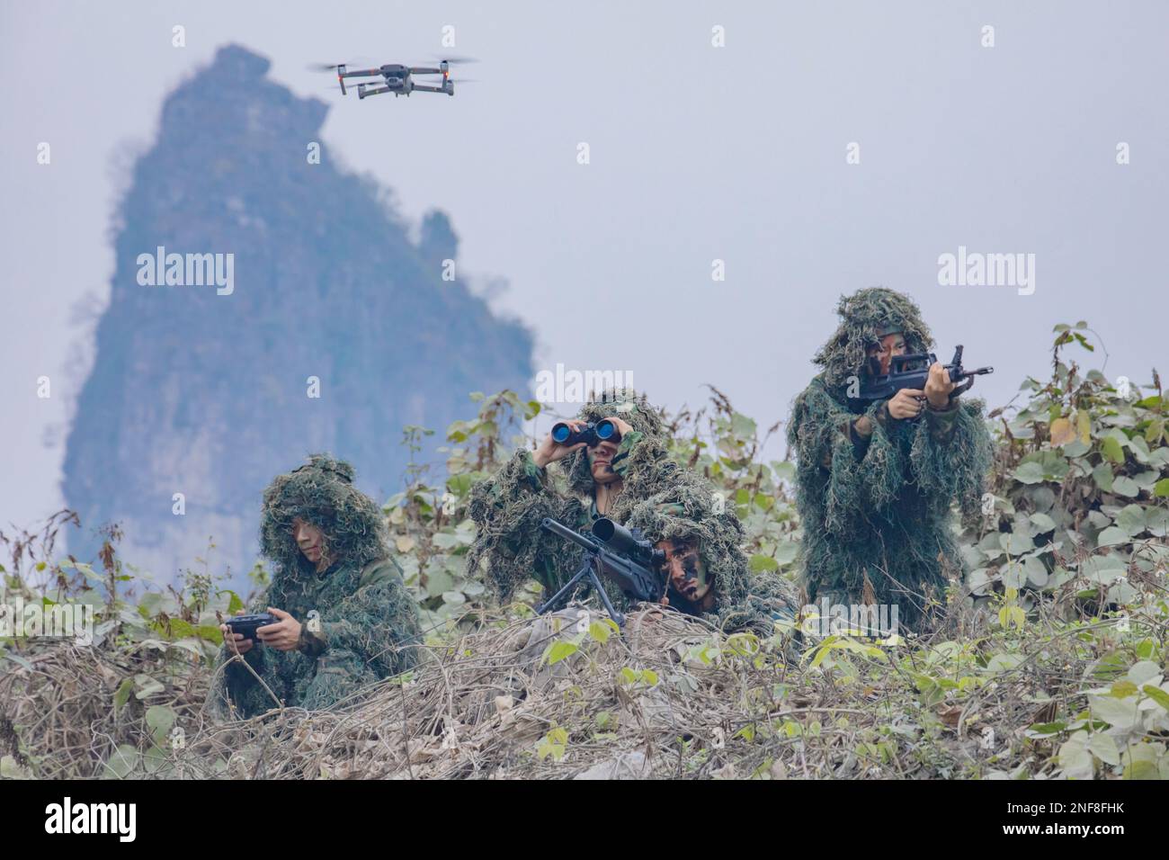 HECHI, CHINA - FEBRUARY 17, 2023 - Special warfare reconnaissance team members conduct a field ...