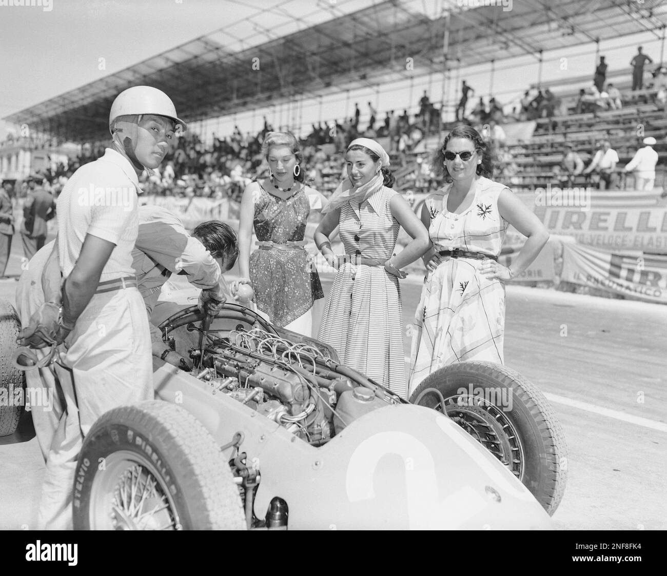 Prince Birabongse of Siam, left, stands by his Maserati during trial ...