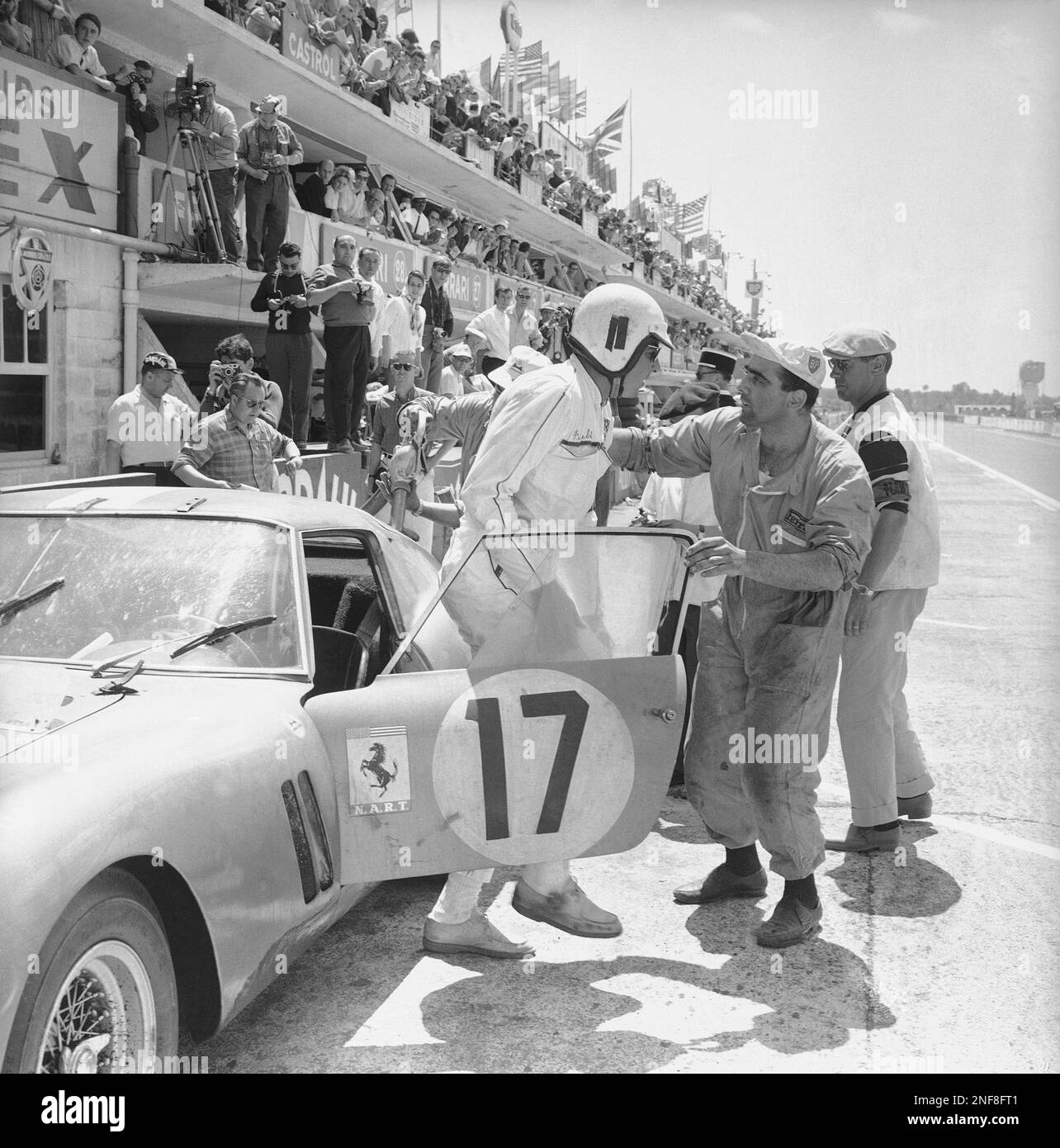 Glenn Roberts of the North American Racing Team gets out of his Ferrari ...