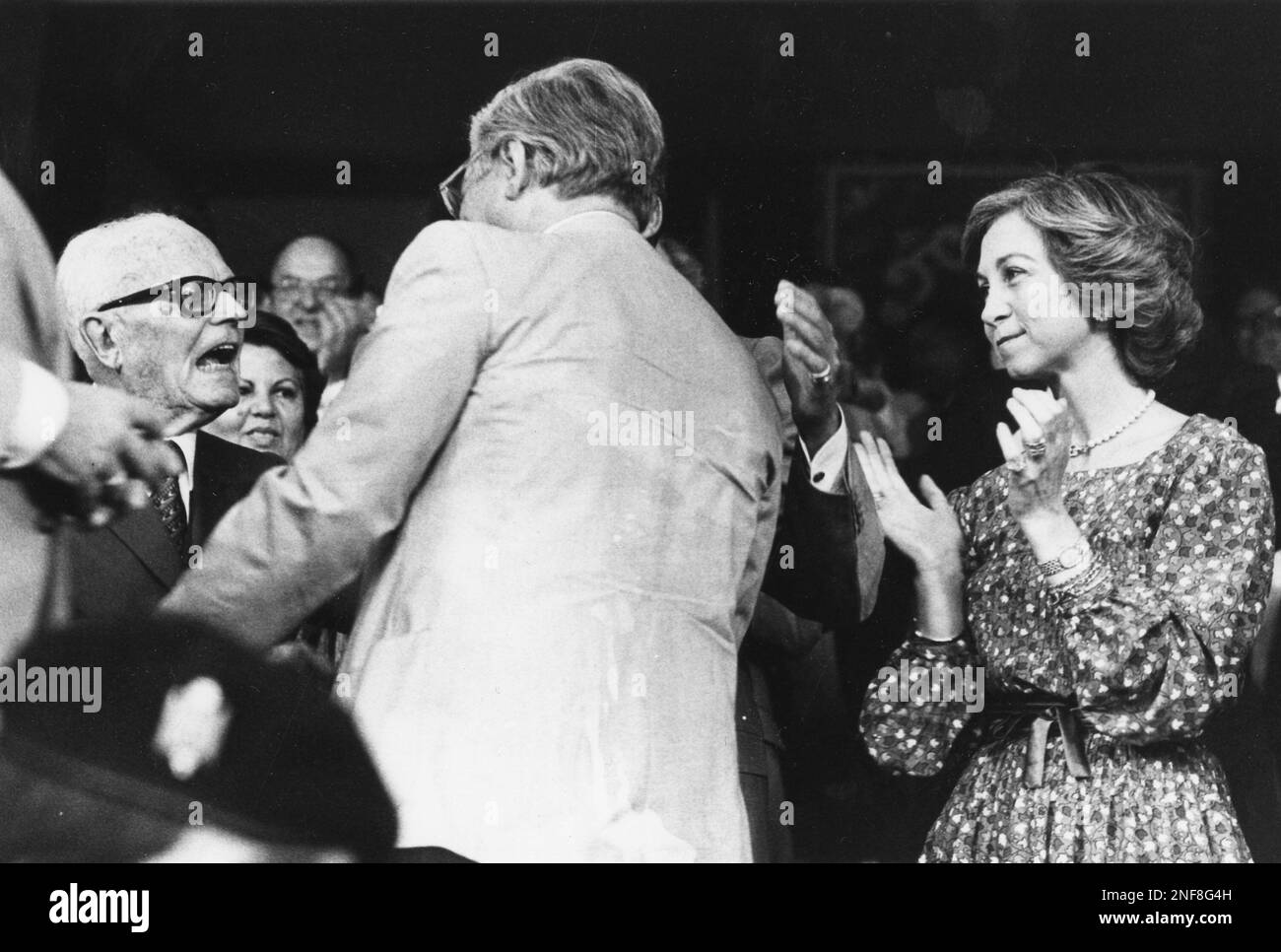 West German Chancellor Helmut Schmidt, center, congratulates Italian ...