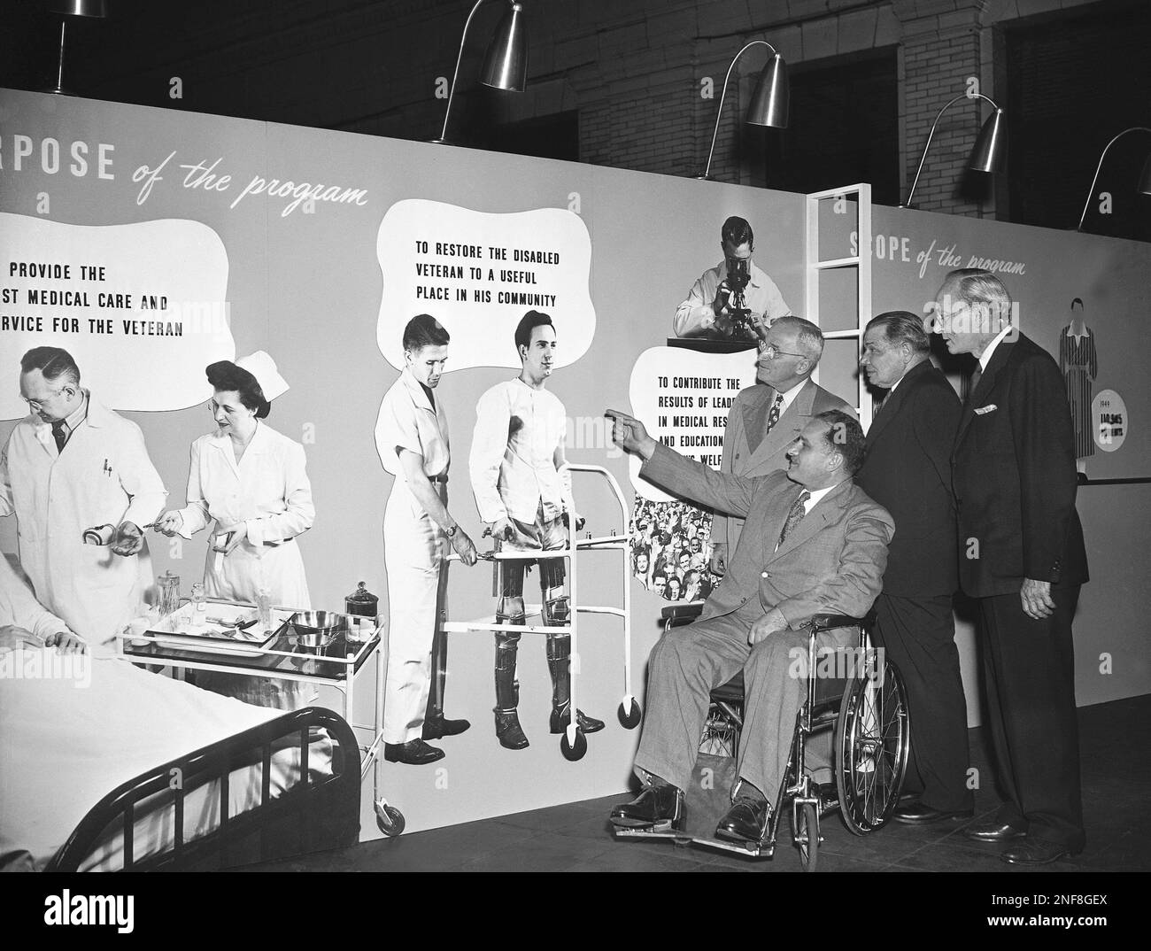 President Harry Truman (left) inspects a Veterans Administration ...