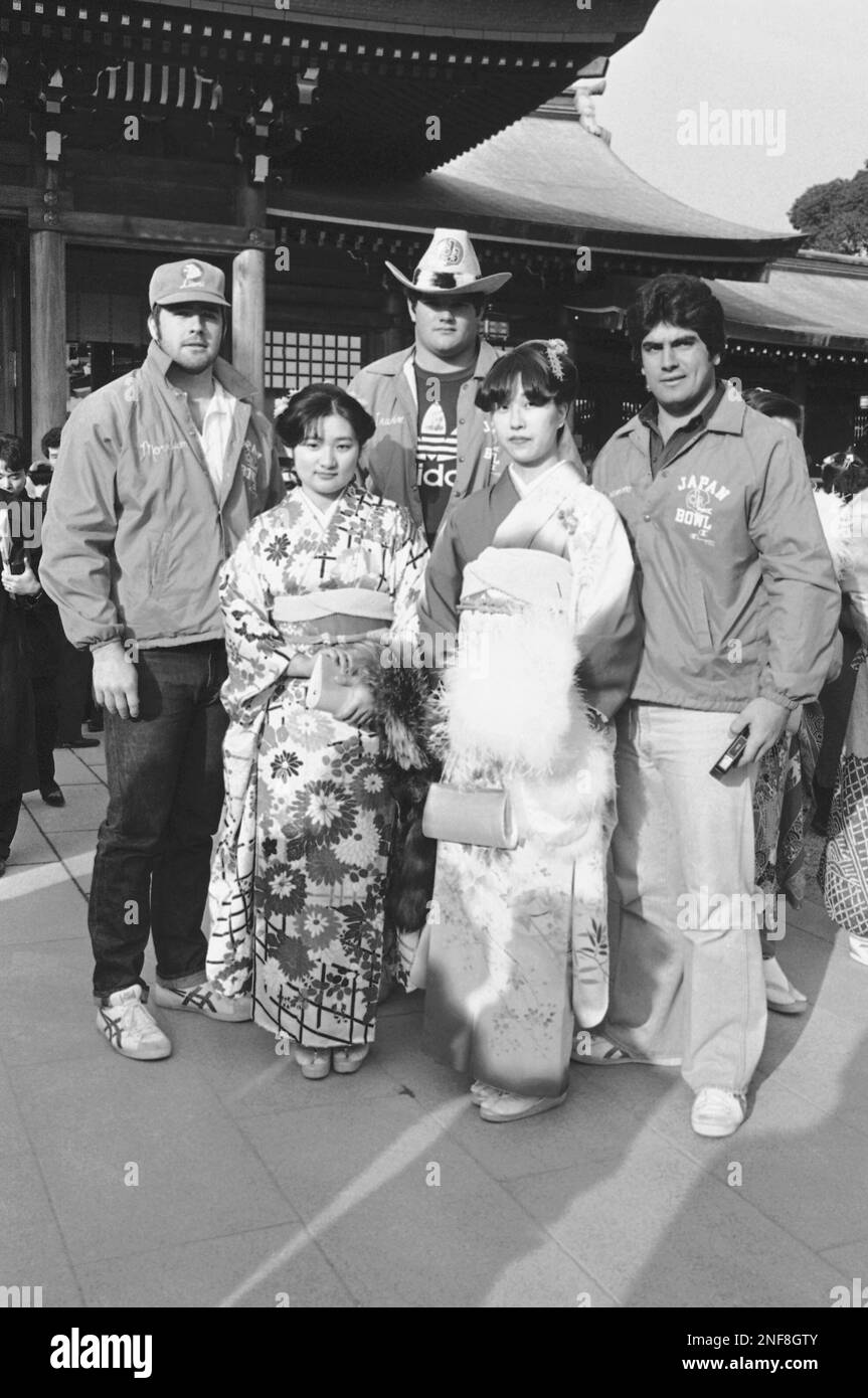 Three American collegiate footballers, from left, Tim Morrison of ...