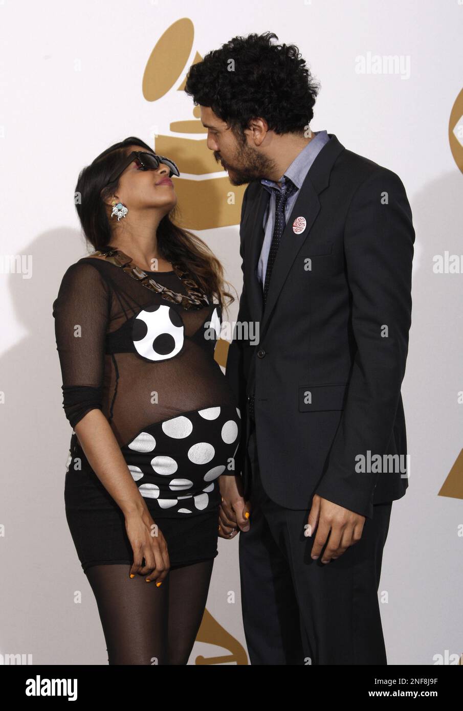 M.I.A., left, and Mike Bender pose for a photo backstage at the 51st ...