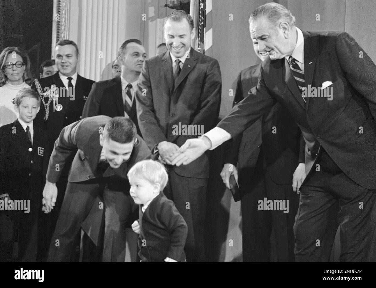 Lyn Nugent, President Lyndon Johnson's young grandson, is the center of ...