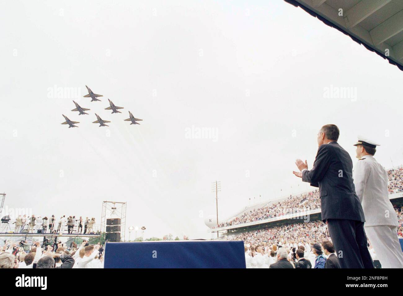 President George Bush and Rear Admiral Thomas C. Lynch, right ...