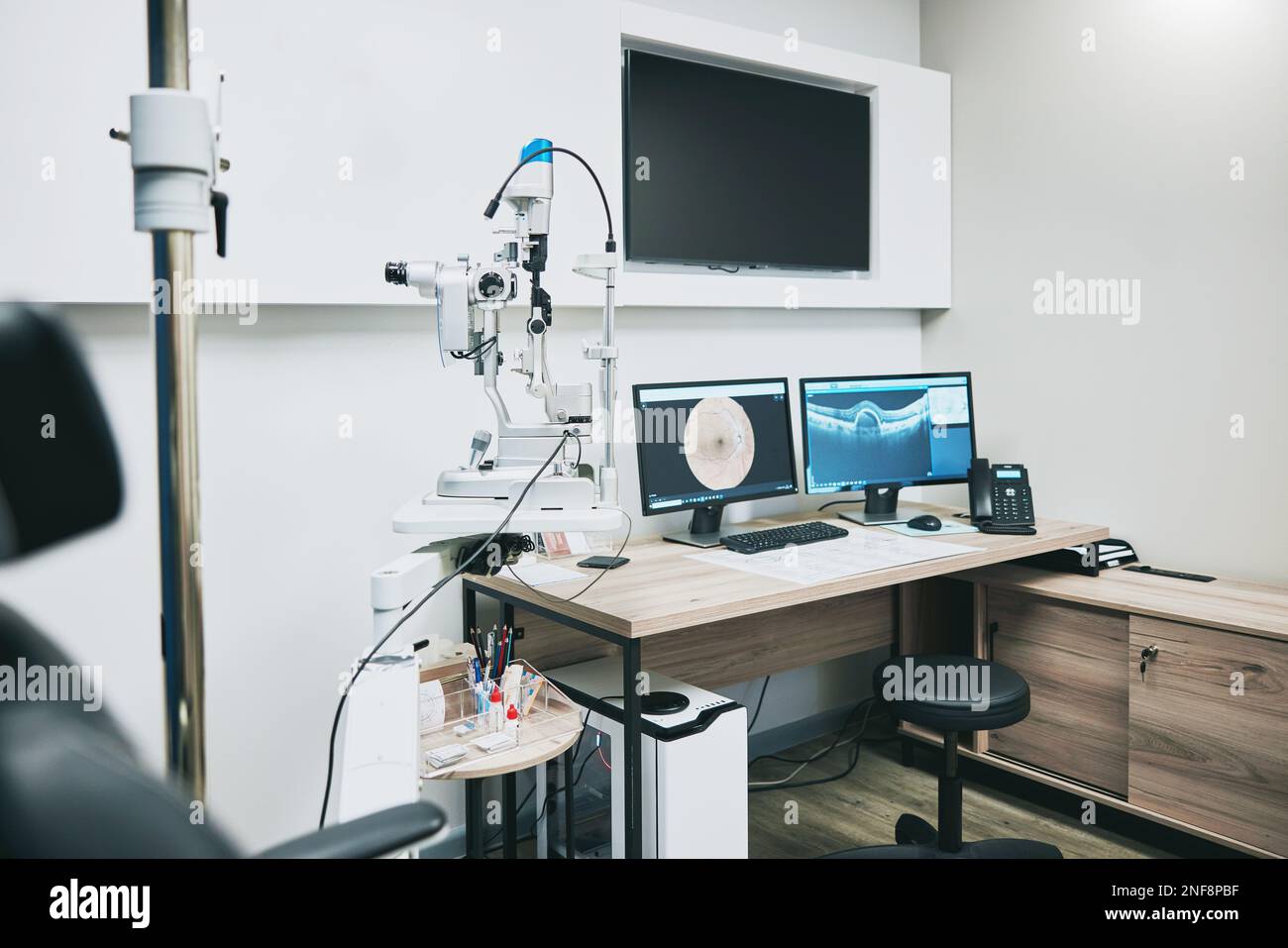 Ophthalmology, computer and empty room with equipment for vision ...