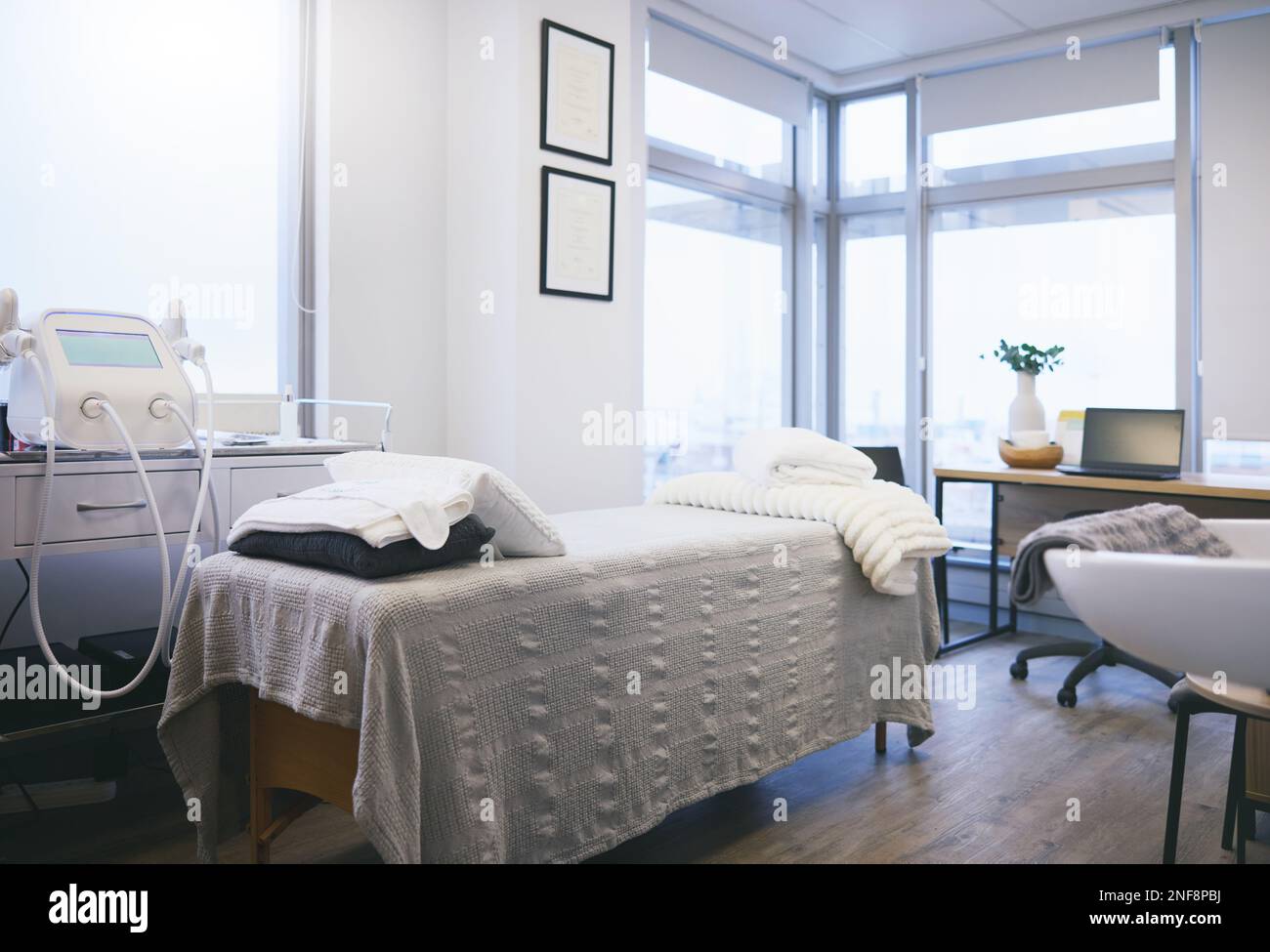 Bed, surgery and empty room for ophthalmology consultation, vision ...