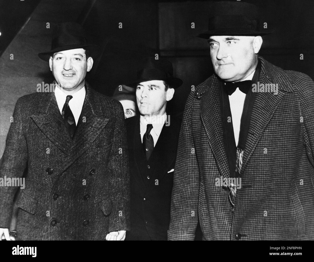 John Paul Chase, center, companion of the slain "Baby Face" Nelson, is ...