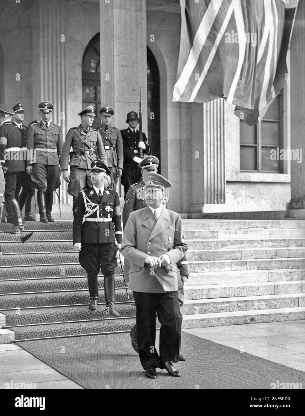 Herr Adolph Hitler leaves the conference hall at Munich, Germany on ...