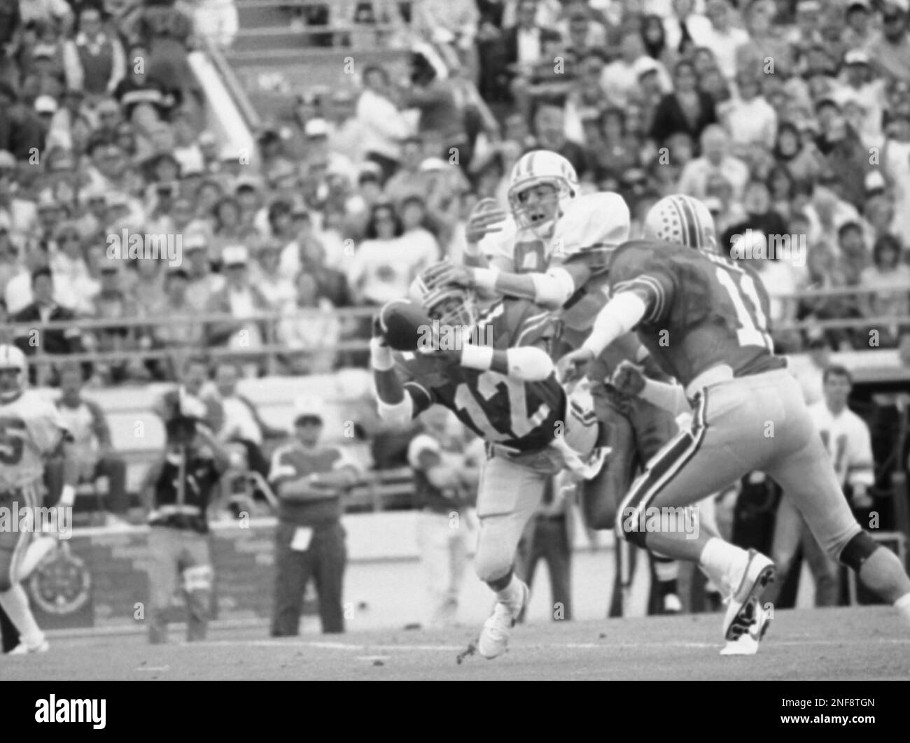Ohio State safety Terry White (12) juggles but misses an interception ...