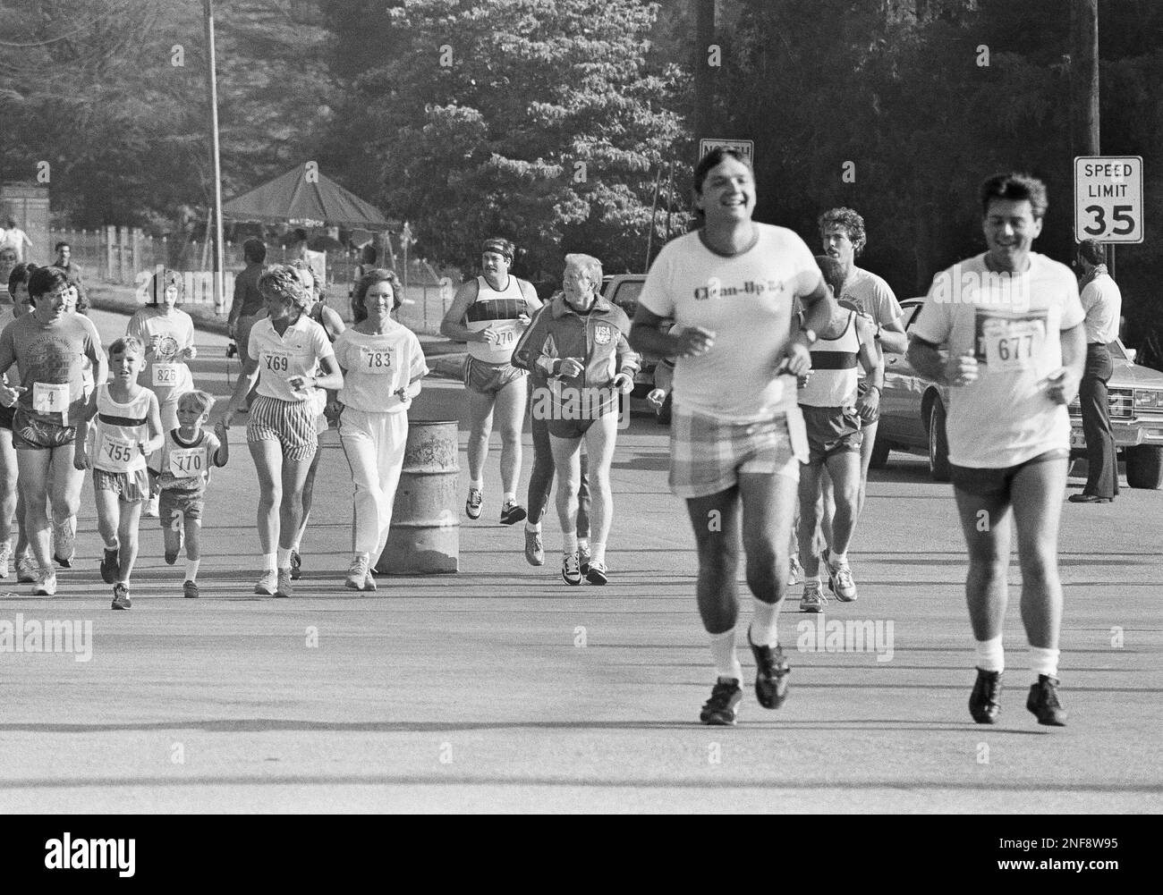 Former President Jimmy Carter and his wife Rosalynn join the crowd ...