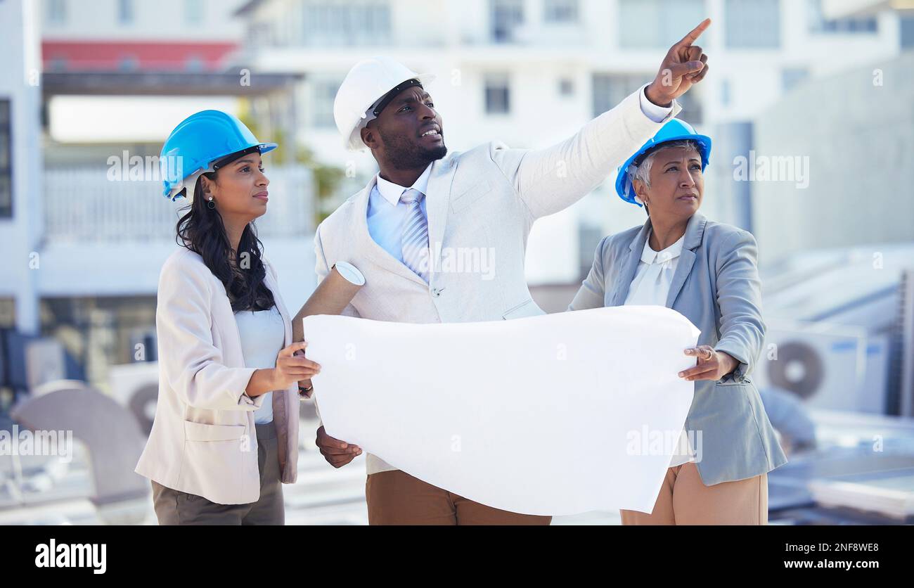 Architecture, engineering and team with blueprint for planning ...