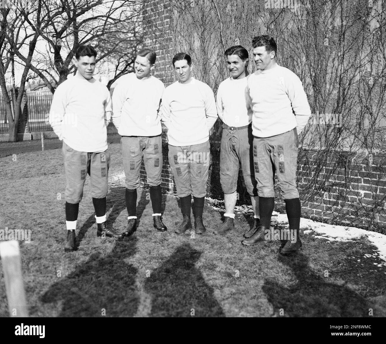 This group of coaches, photographed at spring practice in Cambridge ...