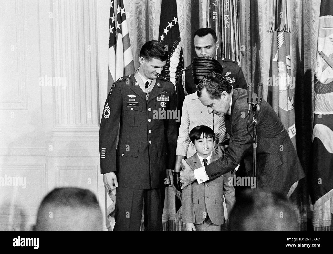President Richard Nixon places Edward Zabitosky, 7, in position for a ...